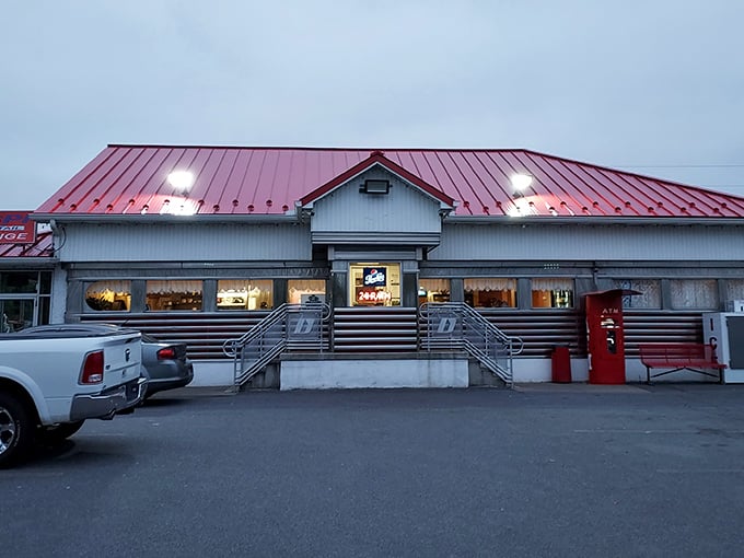 Twilight at D's Diner &ndash; when the lights inside glow with the promise of hot coffee and warm conversation.