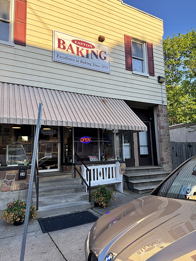 That little white bench isn't just cute—it's strategically placed for when your knees go weak after the first bite of their tomato pie.