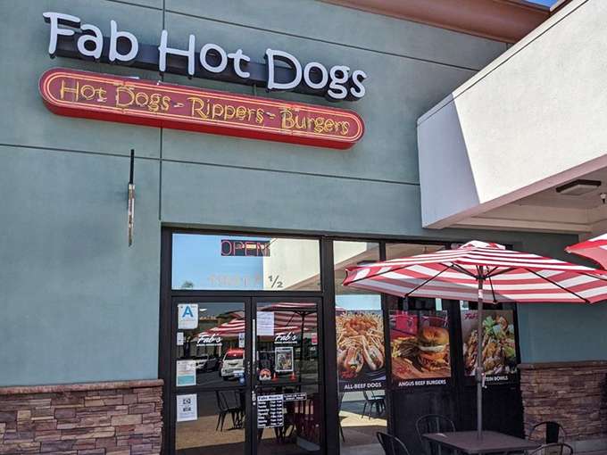 Those red umbrellas offer shade while you contemplate which regional hot dog style will change your life today.