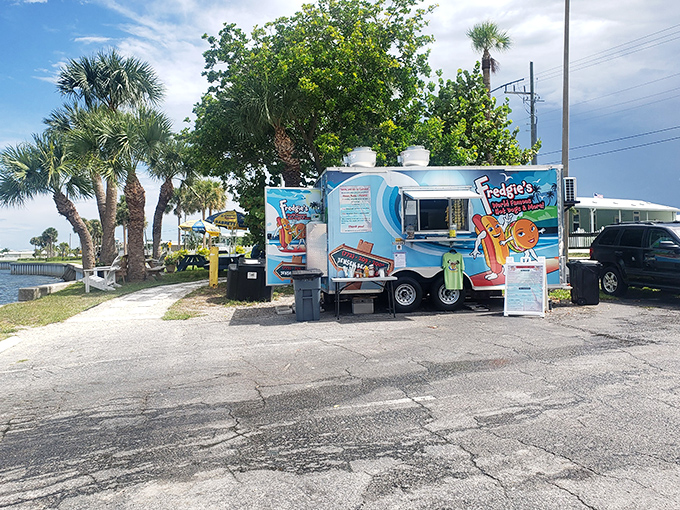 Blue skies, blue truck, endless possibilities - mobile hot dog heaven parked in Florida's most scenic spot.