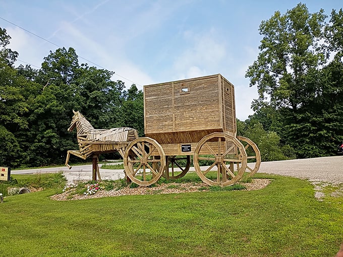 Clip-clop goes the giant wooden horse, forever trotting through Greenwich with its oversized passenger compartment in tow.