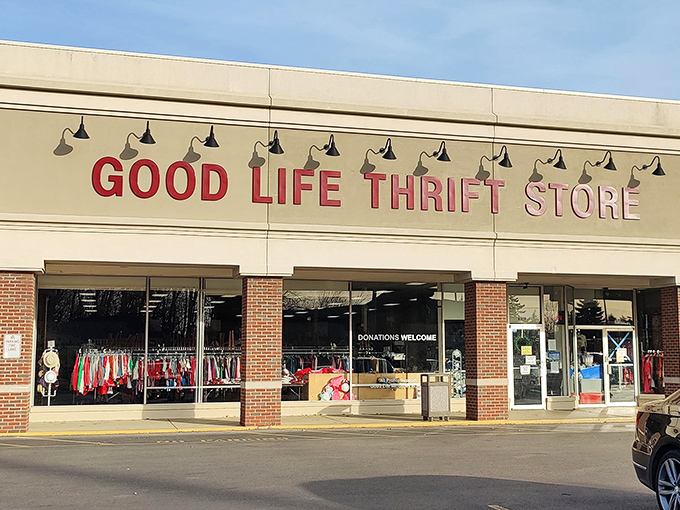 The bright, welcoming storefront displays colorful clothing through spotless windows. This isn't your grandmother's cluttered thrift shop!