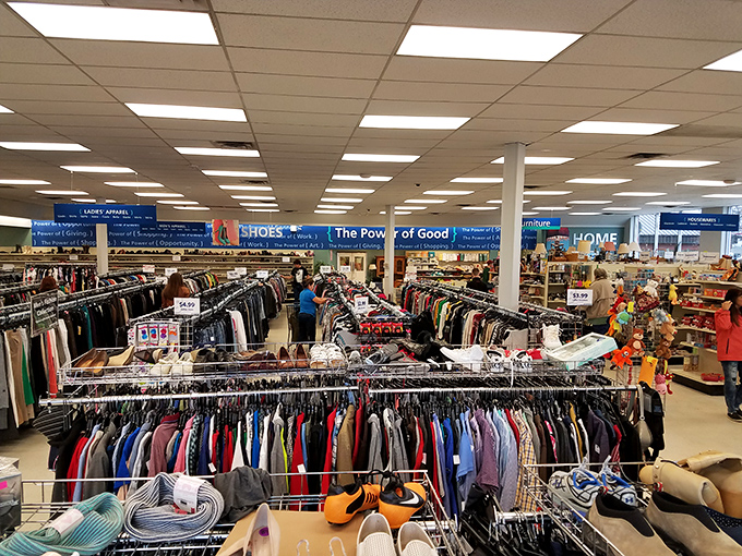 Inside this unassuming storefront lies a wonderland of organized chaos where patient shoppers discover designer labels at dollar store prices.