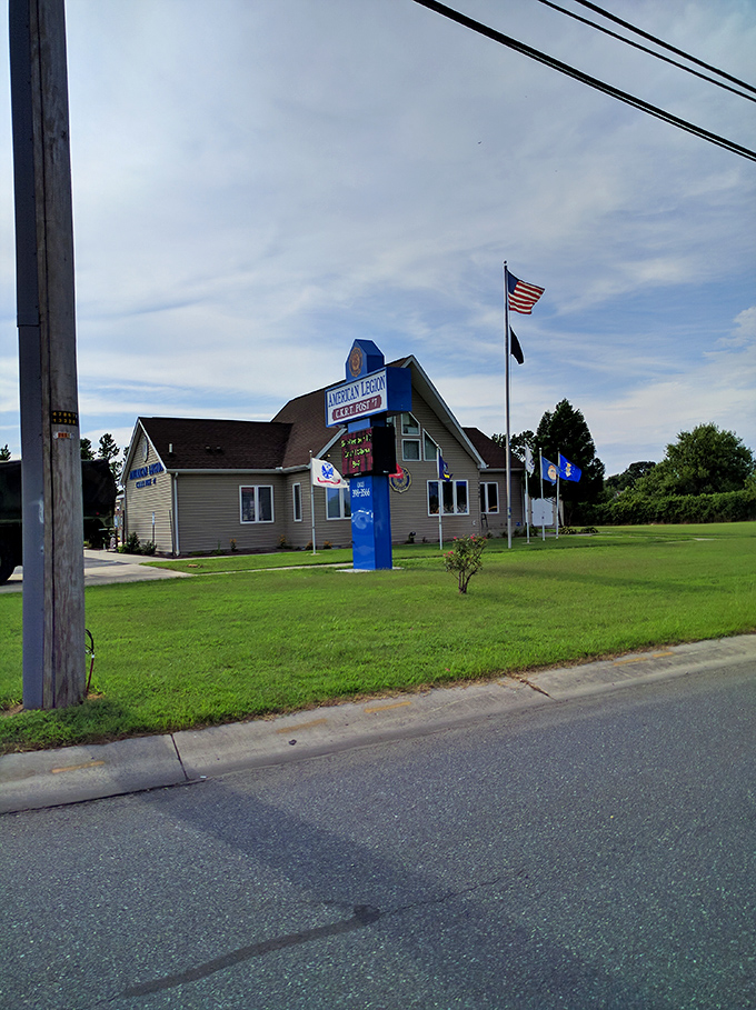 The American Legion post in Harrington proudly flies its flags against the blue sky. This community hub represents the town's strong patriotic spirit.
