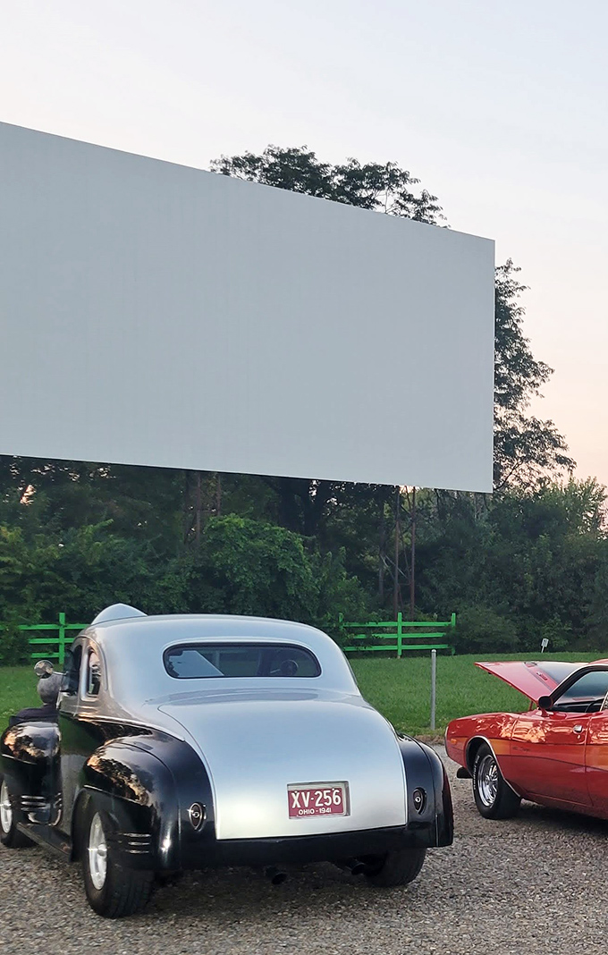 That classic car knows the best spot at Holiday Auto Theatre. Some traditions are worth preserving&mdash;and improving with cupholders!