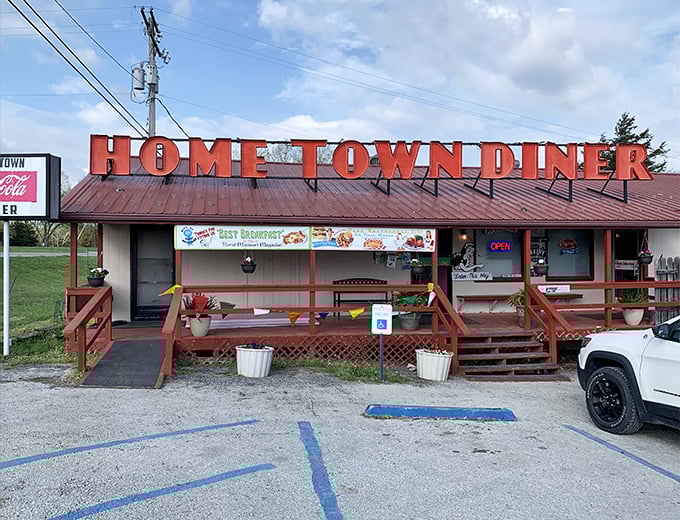 The red trim and welcoming steps promise the kind of meal that makes you forget all about those fancy big-city restaurants.