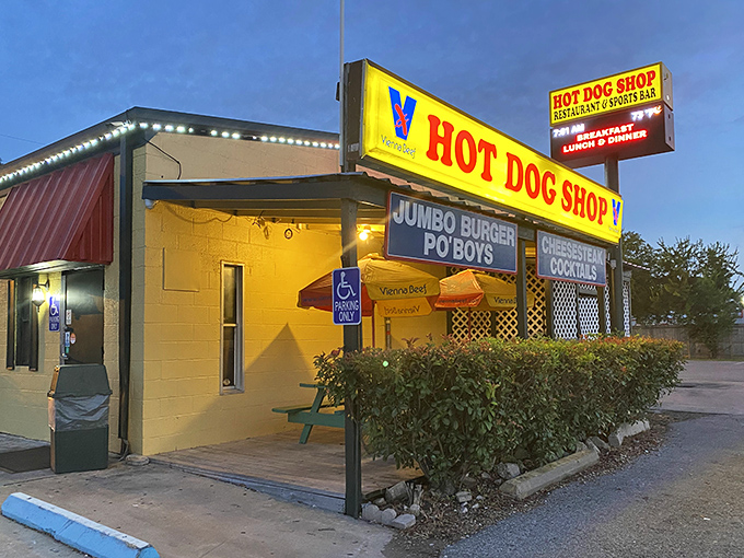 When the sun sets, Hot Dog Shop's illuminated sign guides hungry night owls to hot dog heaven in the heart of Houston.