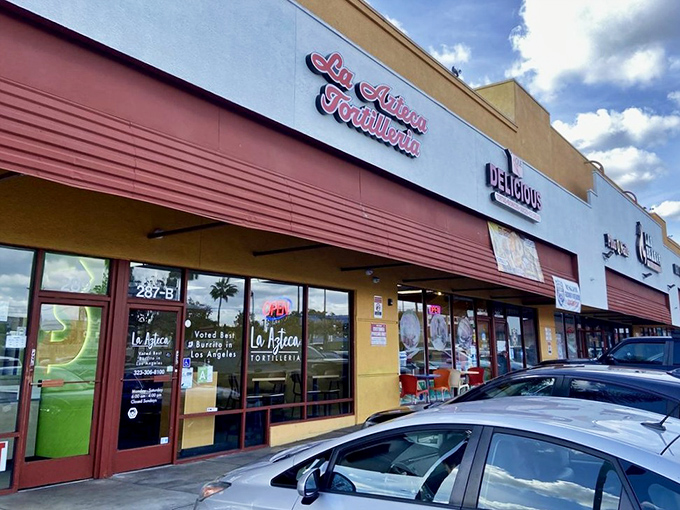 Behind this simple storefront, La Azteca creates burrito masterpieces that have food pilgrims traveling across East Los Angeles for just one bite.