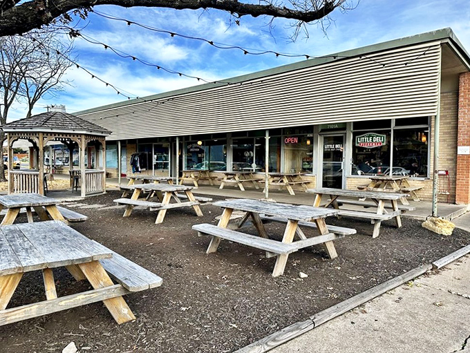 Those wooden picnic tables aren't just seating&mdash;they're front-row tickets to one of Austin's best sandwich shows.
