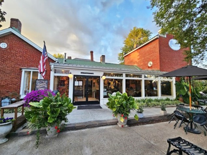 That welcoming porch and simple "CAFE" sign at Monell's promise comfort food served with a side of Southern hospitality.