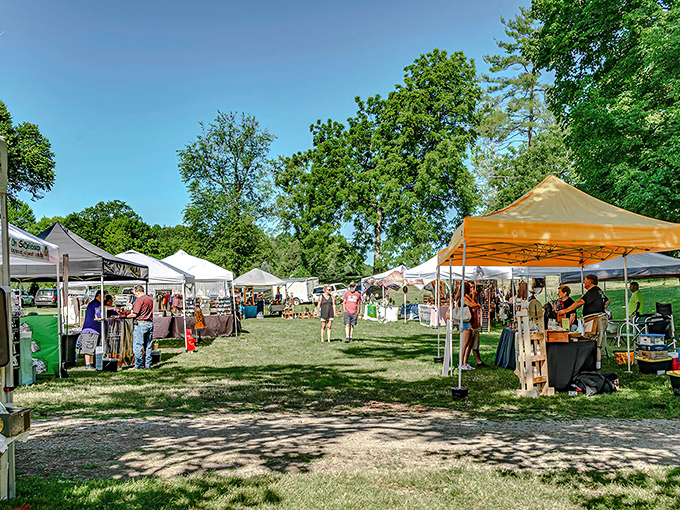 Nature provides the perfect backdrop! Dappled shade and emerald grass create an idyllic setting for Peninsula's curated marketplace.