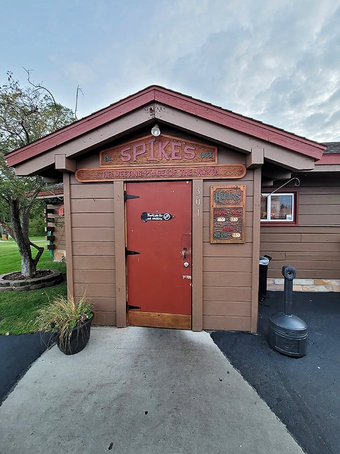 That rustic wooden entrance to Spike's feels like stepping into a burger speakeasy where the password is "delicious."