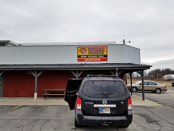 The humble red barn exterior of Taste of Philly houses cheesesteak magic that would make Rocky climb those steps for seconds.