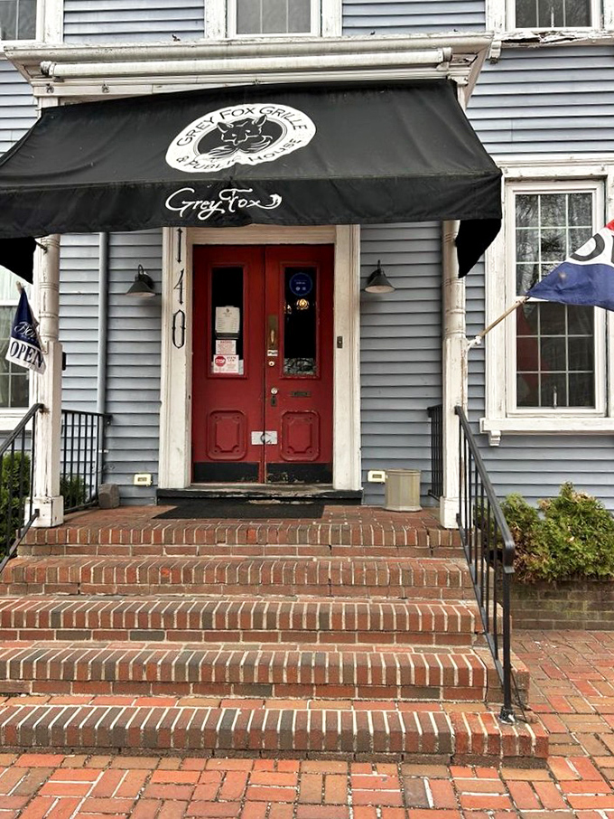 That red door opens to reveal where gourmet meets comfort in perfect harmony. 