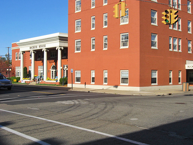 The Buckeye House stands proud in brick elegance, welcoming visitors to this twin-city river community.