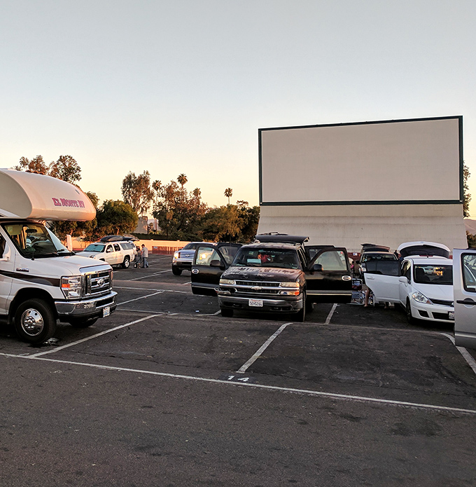 Silhouettes against the silver screen. Van Buren Drive-In creates the perfect backdrop for Southern California's beautiful sunset skies.