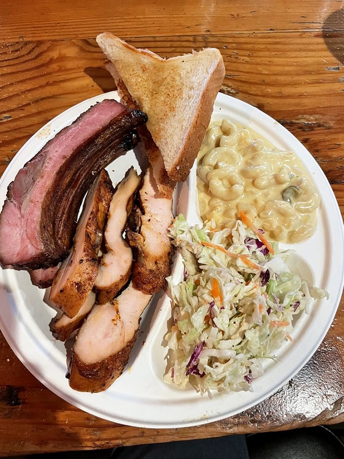 A platter that covers all the bases &ndash; smoky meat, creamy mac and cheese, fresh slaw, and Texas toast for sopping up every last bit of flavor.