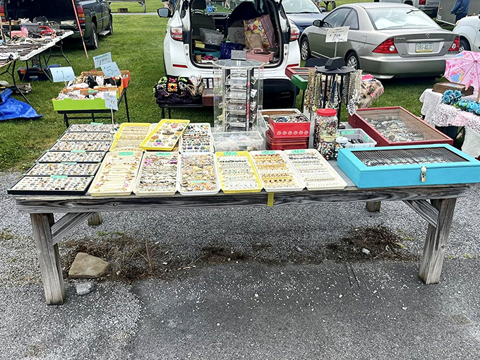 Jewelry hunters' paradise! Trays of vintage pins, earrings, and necklaces await new owners who appreciate the craftsmanship of bygone eras.