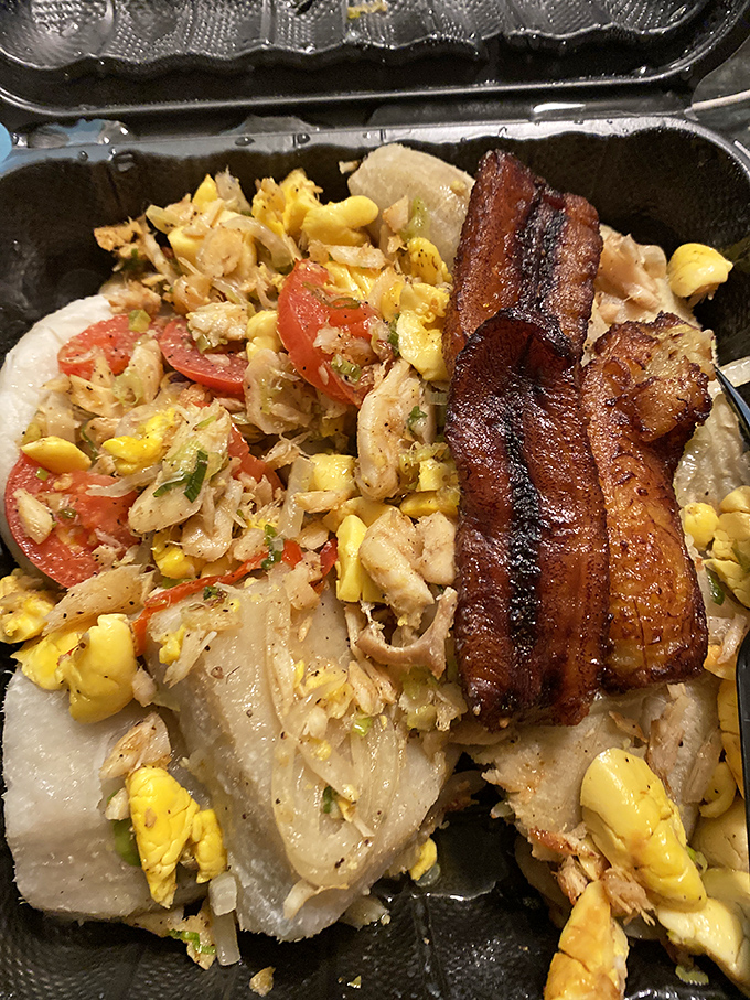 Jamaica's national dish looking picture-perfect. Ackee and saltfish with those caramelized plantains is breakfast elevated to an art form.
