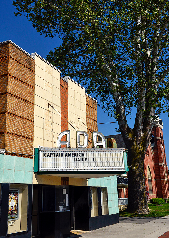 The Ada Theater marquee promises Captain America and small-town movie magic—no big city ticket prices required!