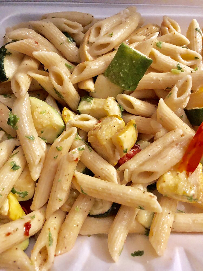 Pasta primavera that proves vegetables and carbs can live together in perfect harmony. Simple ingredients transformed into something magical.
