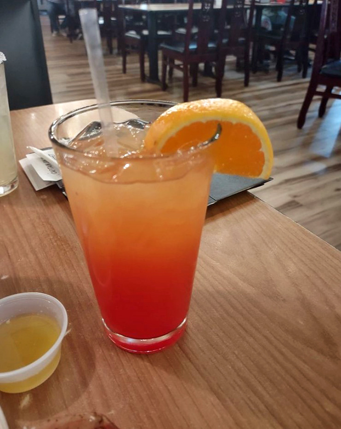 The "American Sunset" cocktail lives up to its name&mdash;layers of orange and red that look like Tennessee sky at dusk, but taste like tropical paradise.