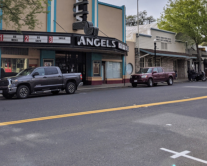 The Angels Theatre marquee still promises entertainment in a town where Netflix hasn't quite replaced the joy of community gathering. 