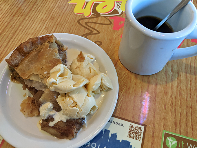 A slice of homemade apple pie alongside a mug of diner coffee&mdash;the dessert equivalent of a warm hug from your favorite aunt.