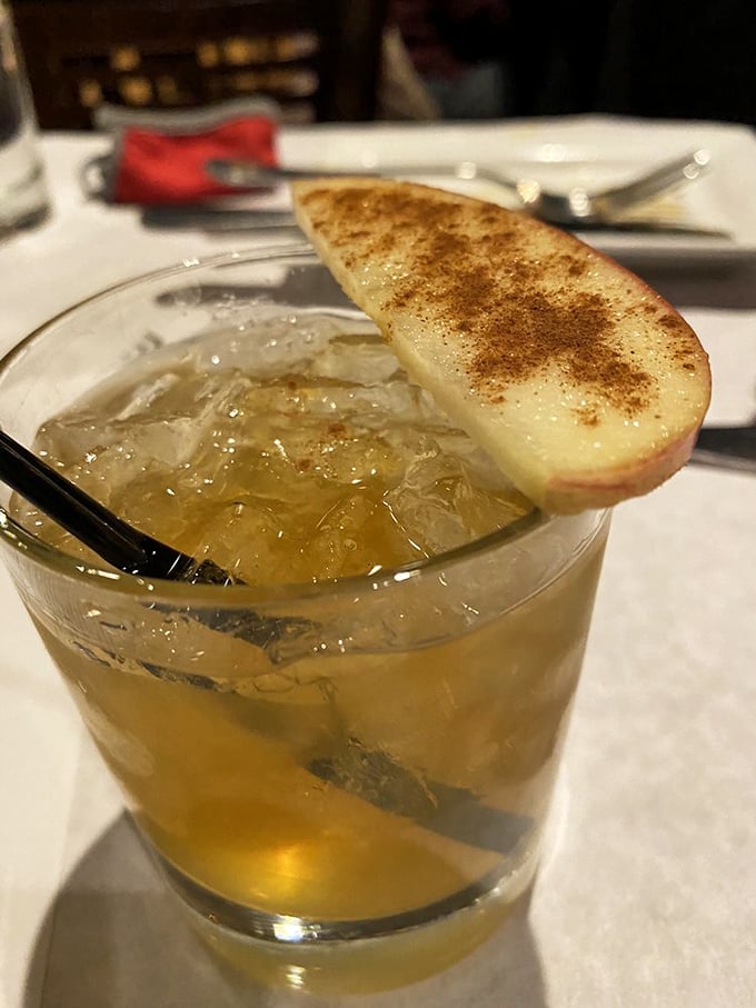 This isn't just a cocktail&mdash;it's a liquid dessert with a pedigree, complete with a cinnamon-dusted apple slice crown.