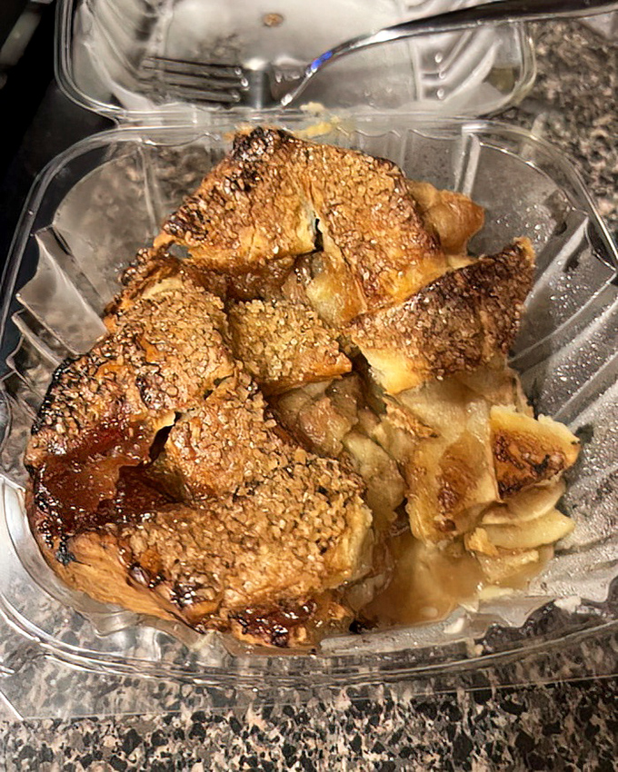 This isn't just apple pie &ndash; it's an architectural marvel of flaky pastry, caramelized fruit, and sesame seeds that somehow makes sense together.