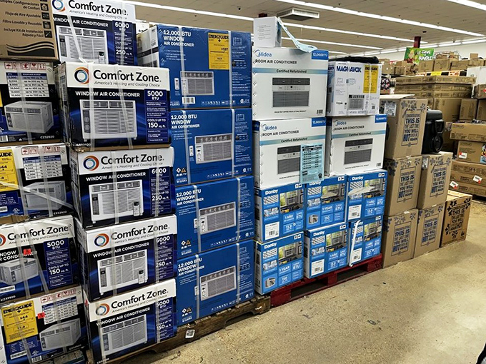 Air conditioners stacked like building blocks of summer salvation, ready to rescue you from Missouri's humid embrace.