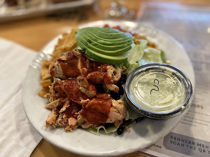 BBQ chicken gets the California treatment with fresh greens and avocado&mdash;like your healthy salad made a delicious detour through the smoker.
