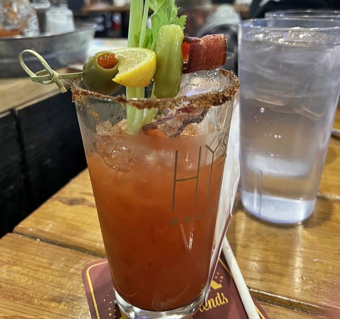 The Bacon Bloody Mary: breakfast, cocktail, and dare all in one glass. That celery stick is fooling absolutely no one.