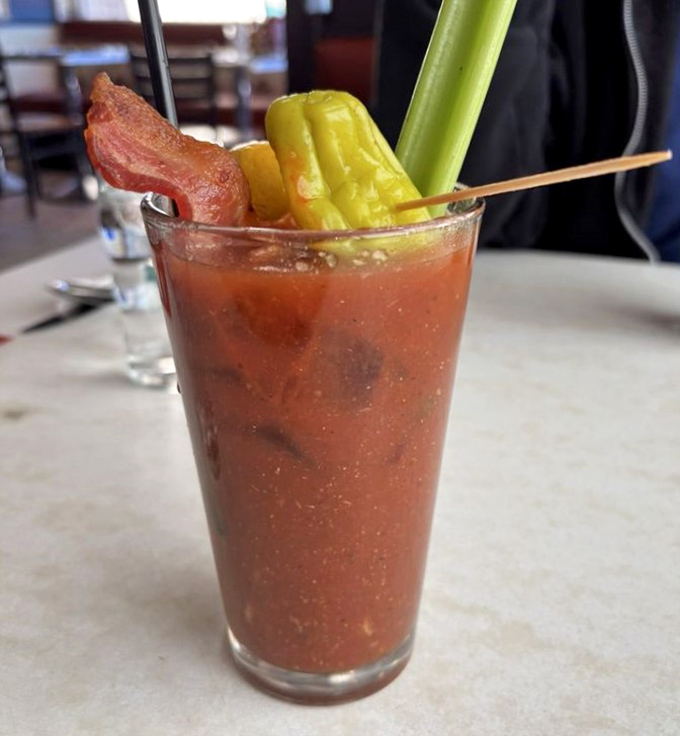 A Bloody Mary that doubles as both cocktail and appetizer &ndash; the bacon strip isn't garnish, it's an exclamation point.