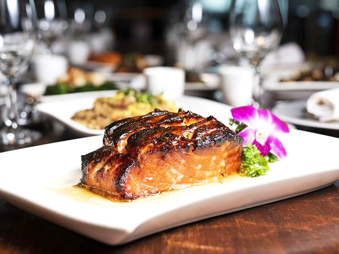 This black cod has clearly been taking glazing lessons from caramel. The fish looks like it's wearing an amber evening gown to the seafood ball.