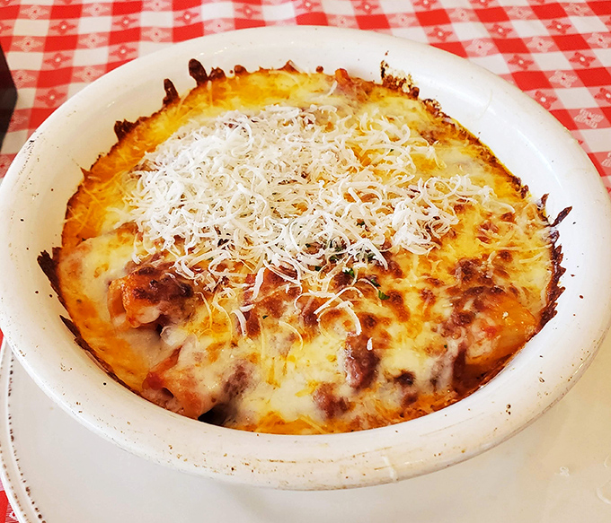 This baked rigatoni isn't just dinner &ndash; it's a bubbling cauldron of cheese and tomato that whispers, "Diet? What diet?"