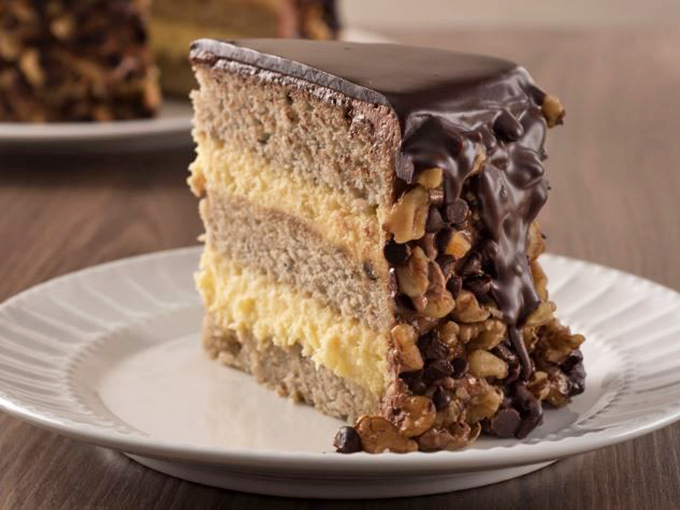 This banana dream cake doesn't just satisfy your sweet tooth&mdash;it throws a full-blown carnival for it, complete with chocolate ganache and walnut confetti.