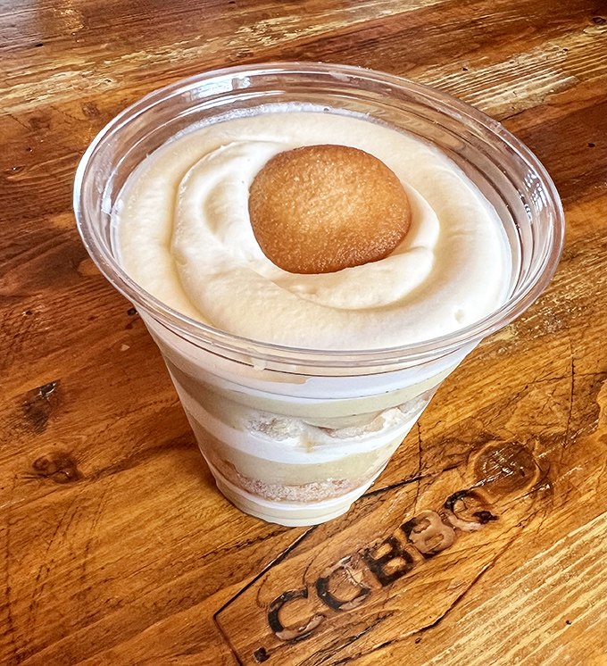Banana pudding with vanilla wafers &ndash; the dessert equivalent of a warm hug from grandma. Sweet closure to a smoky symphony.