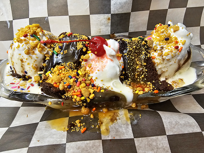 This banana split isn't just dessert—it's an architectural achievement that makes the Taj Mahal look like it wasn't really trying.