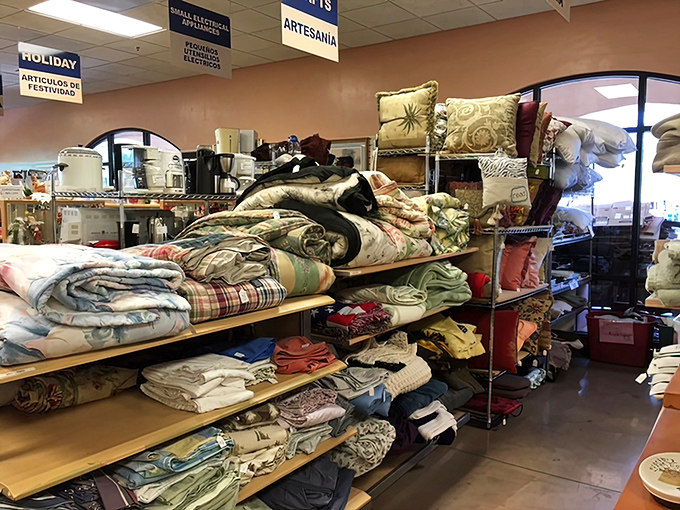 Bedding and linens stacked with the precision of a luxury department store&mdash;except here, your wallet won't need trauma counseling afterward.