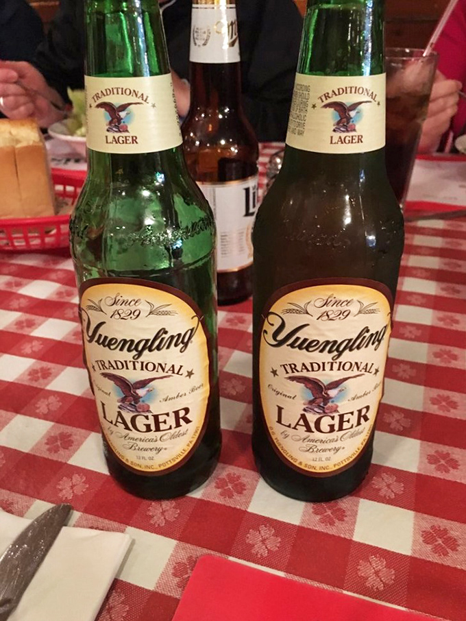 Yuengling bottles standing at attention on classic red-checkered tablecloths &ndash; Pennsylvania's liquid pride paired with comfort food is a match made in Keystone State heaven.