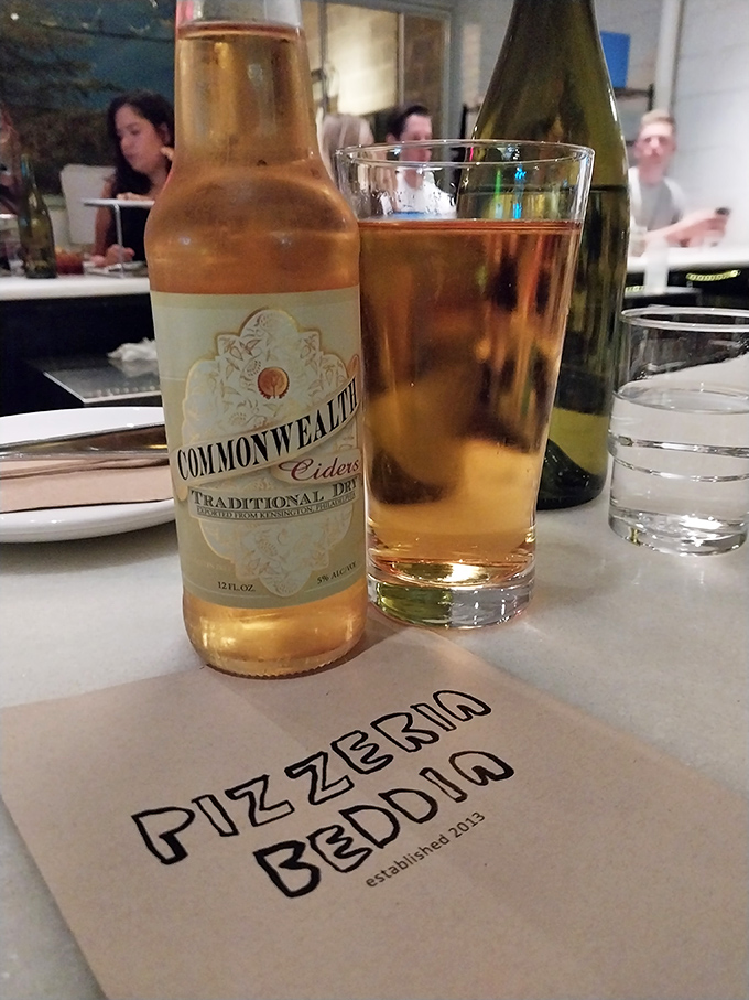 Commonwealth Cider alongside Beddia's menu&mdash;proof that Pennsylvania knows how to pair local libations with world-class pizza.
