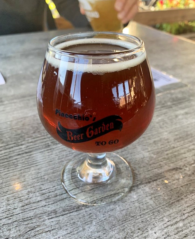 Pinocchio's Beer Garden glass&mdash;where craft beer comes to play in a goblet that says, "Yes, I'm serious about my pizza pairings."