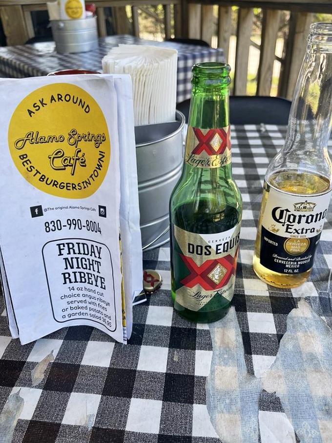Cold beer and Friday night ribeye specials advertised on checkered tablecloths—a Texas Hill Country love letter if ever there was one.