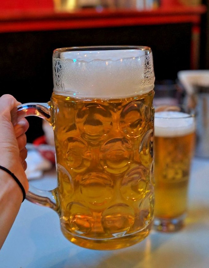 Cold beer and warm vibes &ndash; the universal language of a perfect casual dining experience.