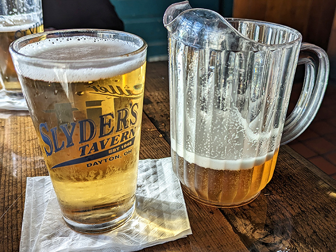 Cold beer in a proper glass with a pitcher standing by&mdash;because Slyder's understands that good things should never come to an end too quickly.