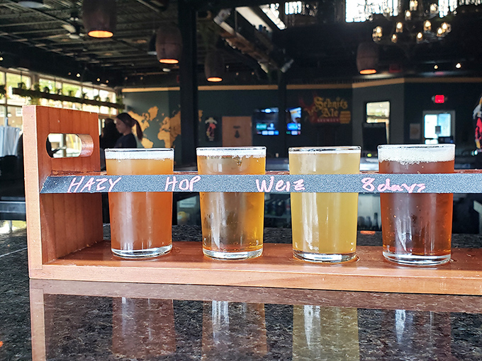 A flight of liquid amber treasures, each with its own personality. From "Hazy" to "Weiz," this wooden runway showcases the brewery's craft credentials.