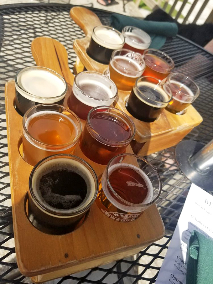 A wooden flight of liquid possibilities. Each glass holds a different adventure&mdash;from hoppy journeys to malty explorations.