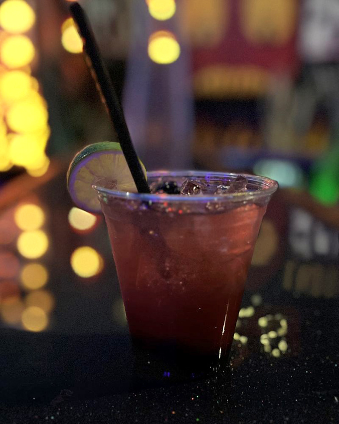 The signature cocktail brings beloved characters to life in liquid form with theatrical flair.