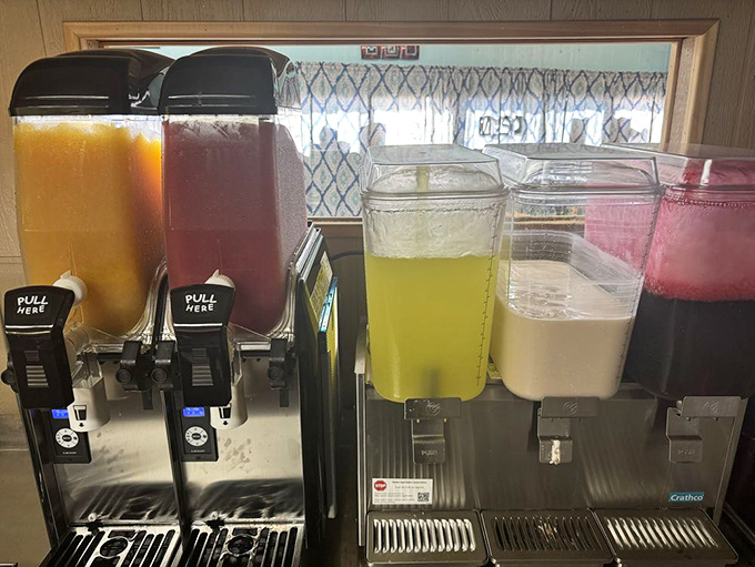 The aguas frescas station&mdash;where technicolor refreshment awaits in flavors that bottled sodas can only dream about.